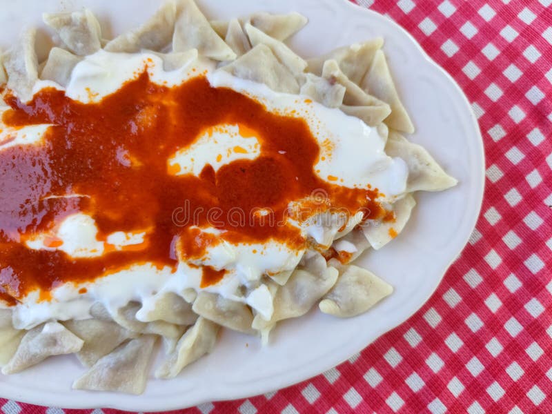 Manti with sauce stock photo. Image of tortelloni, pasta - 227485264