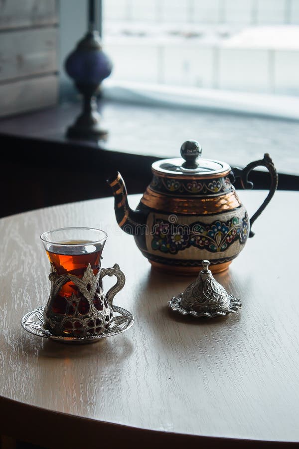 Turkish Tea in Traditional Glass on Table. Drink in National Restaurant ...