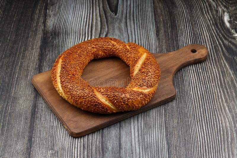 Turkish Traditional Bagel Simit with Sesame on Rustic Table, Turkish ...