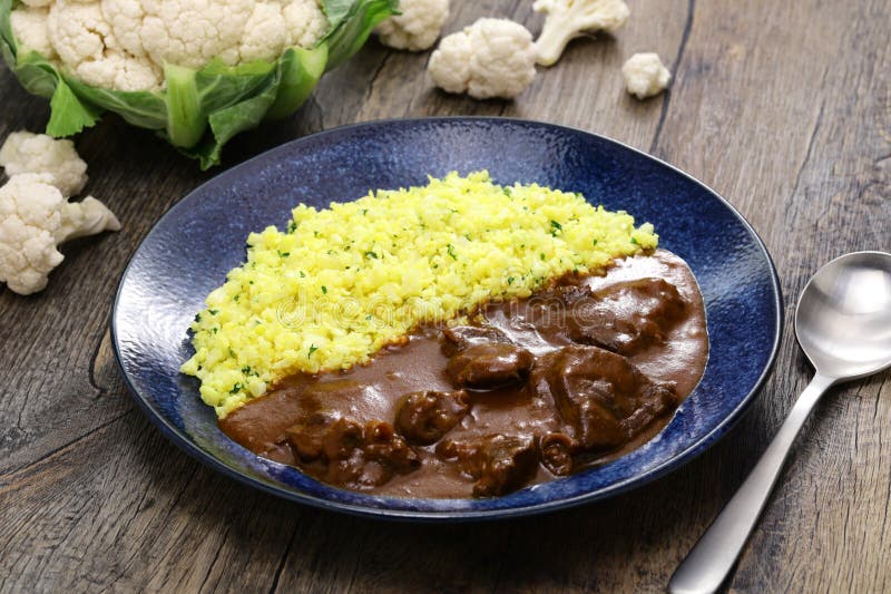 Turmeric Cauliflower Rice and Beef Curry Stock Photo - Image of ...