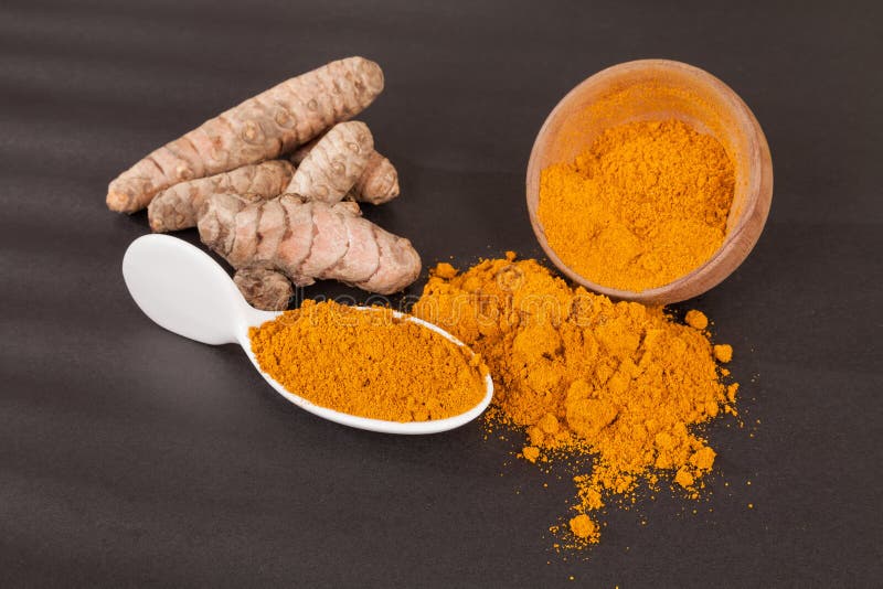 Turmeric - Curcuma Longa Root and Turmeric Powder Stock Photo - Image ... Turmeric - Curcuma Longa Root and Turmeric Powder Stock Photo - Image ...