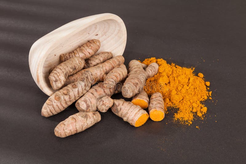 Turmeric - Curcuma Longa Root and Turmeric Powder Stock Image - Image ... Turmeric - Curcuma Longa Root and Turmeric Powder Stock Image - Image ...