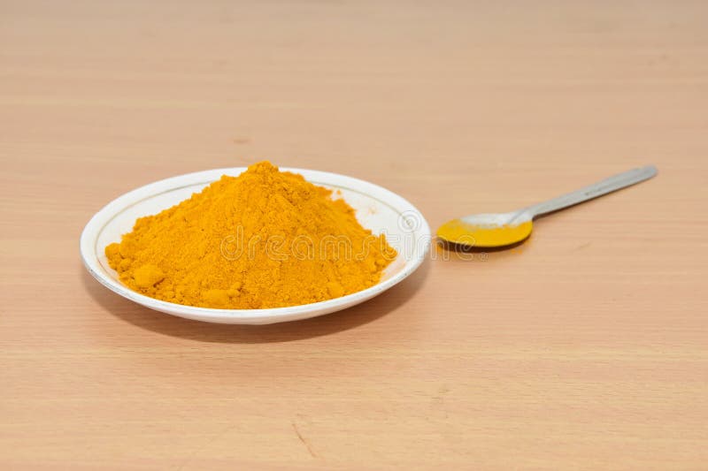 Turmeric Powder Also Called Haldi in India with Spoon. Stock Photo ...