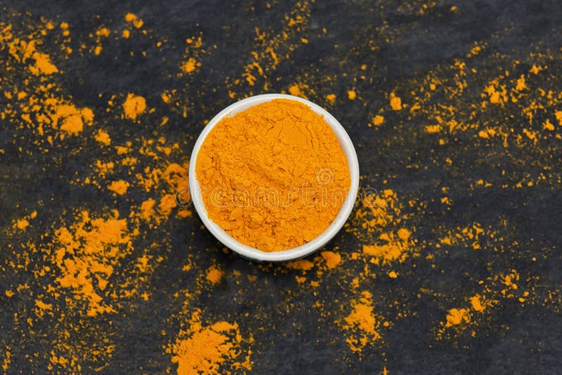 Turmeric Powder on Ardesia Stone Stock Image - Image of vegan, vase ...