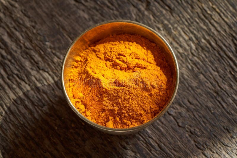 Turmeric Powder in a Bowl on a Table Stock Photo - Image of diet, food ...