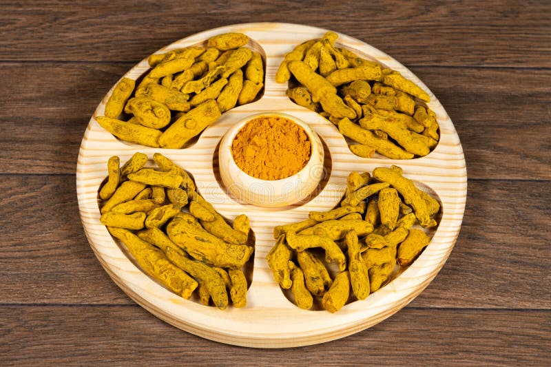 Turmeric Powder and Dried Turmeric Root Top View. Stock Photo - Image ...