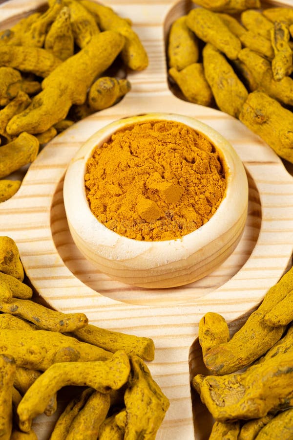 Turmeric Powder and Dried Turmeric Root Top View. Stock Image - Image ...