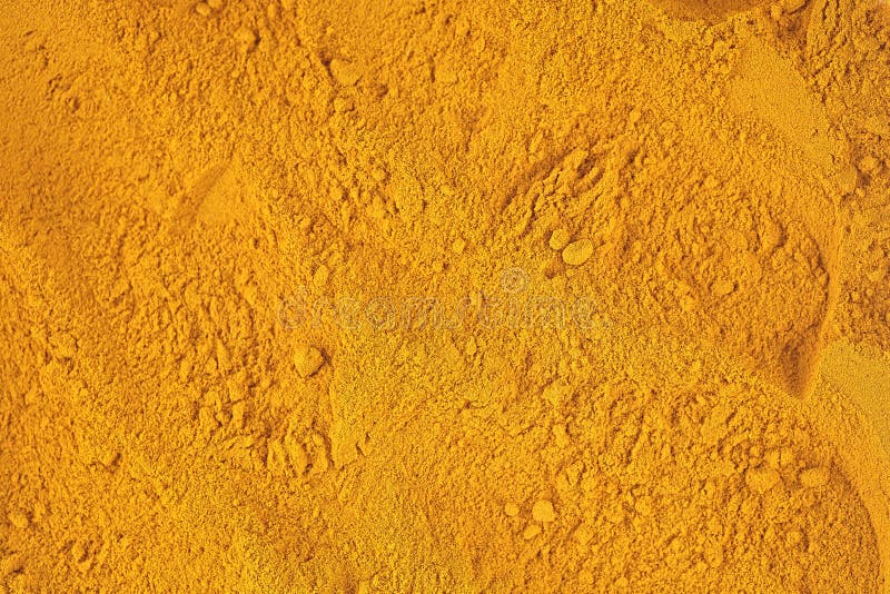 Turmeric Powder Pile As Background and Texture, Top View. Stock Photo ...