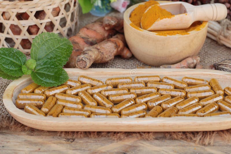 Turmeric Powder with Tumeric Capsules for Health. Stock Image - Image ...