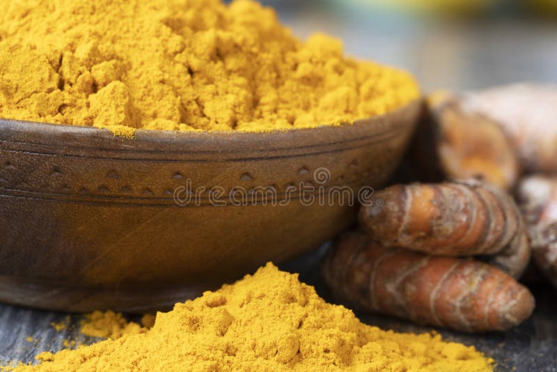 Turmeric Powder in Wooden Bowl Stock Image - Image of health, food ...