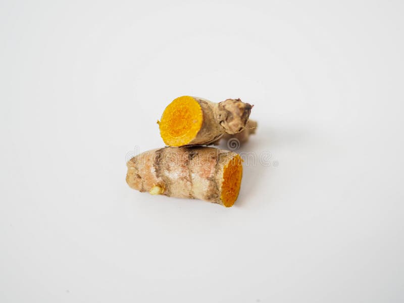 Turmeric Root Cross-section with Golden Core on Clean White for ...