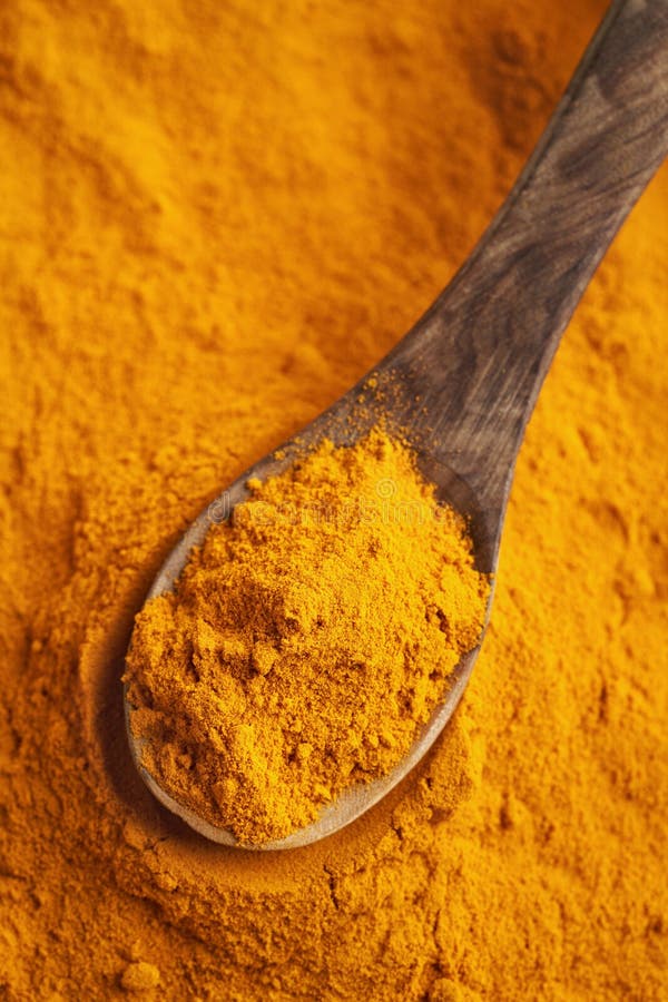 Turmeric Root Powder on a Spoon Stock Photo - Image of spice, powder ...