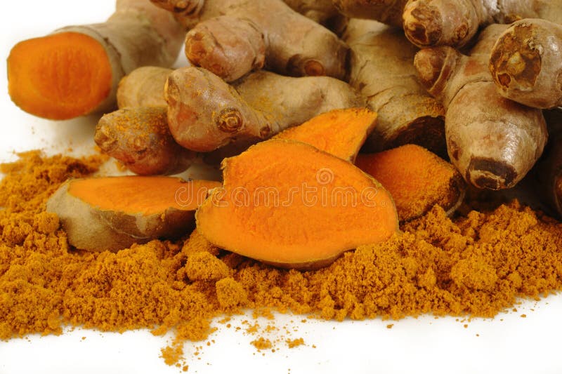 Turmeric root on white stock photo. Image of spices - 216418496