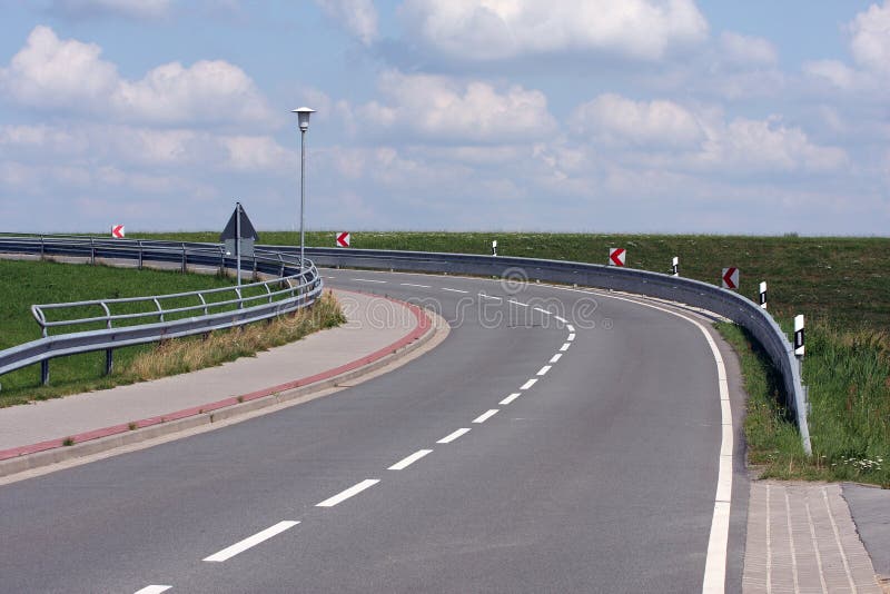 At the Turn of the Asphalt Road Stock Image - Image of impingement ...