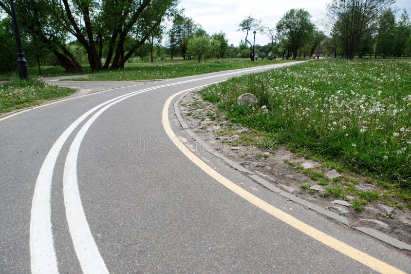 Turn of Bike Path in Spring Park. Empty Road Stock Image - Image of ...