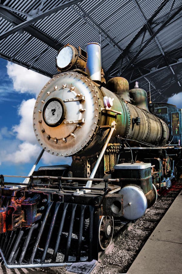 A Turn of the Century Coal Burning Steam Engine Locomotive Loading at ...