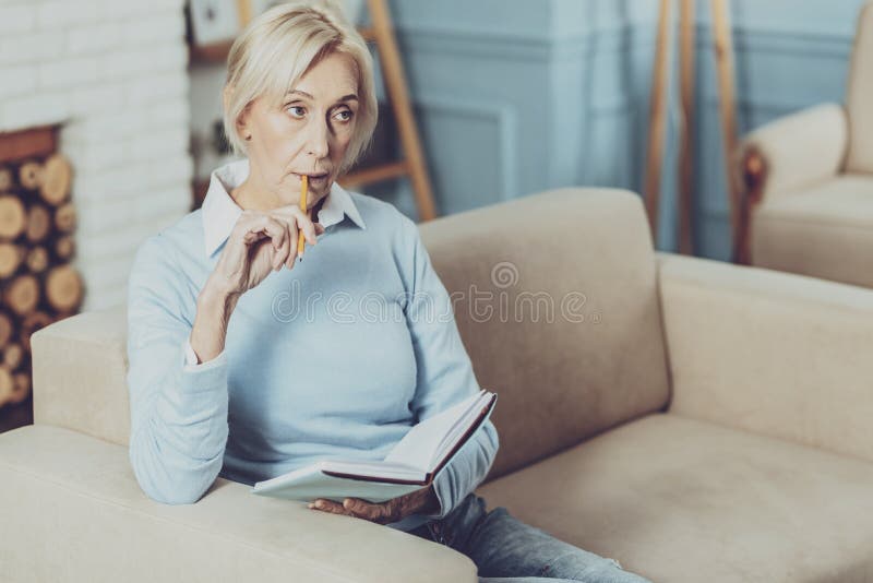 Thoughtful Retirement Working at Her Project Stock Photo - Image of ...