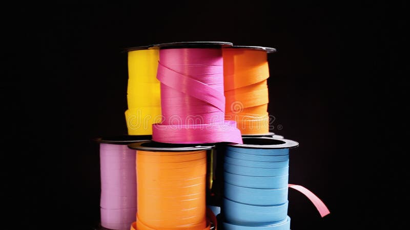 Turn ribbon spools pile stock footage. Video of fabric - 102775556