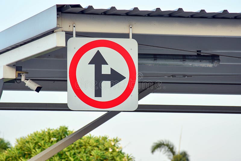 Turn Right and Go Straight Traffic Sign in the Park Stock Image - Image ...