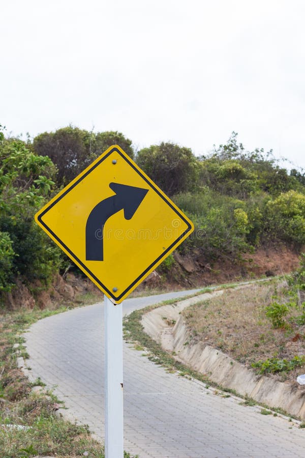 Turn right at warning sign stock image. Image of guidance - 43287113