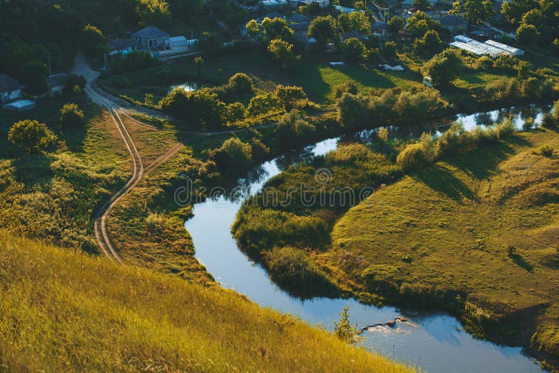 Turn of river at village stock image. Image of quiet - 201165389