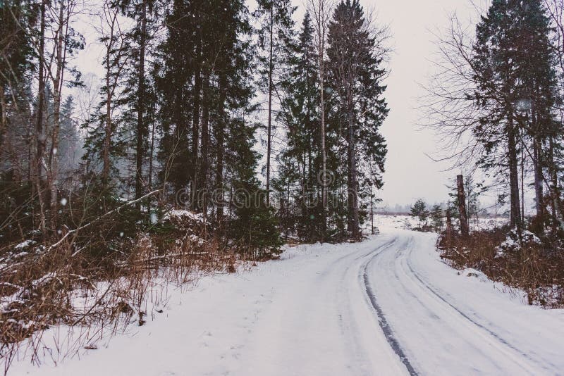 Turn on a Rural Road in Snow through a Winter Field Stock Photo - Image ...