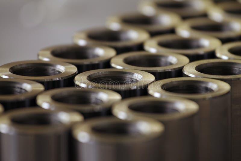 Turned metal cylinders stock image. Image of channel - 20090359