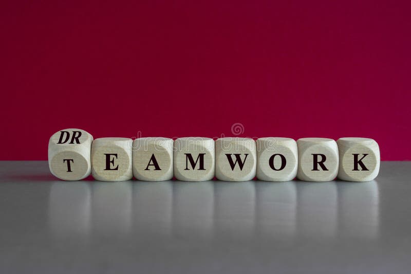 Turned a Wooden Cube and Changes the Word Teamwork To Dreamwork ...
