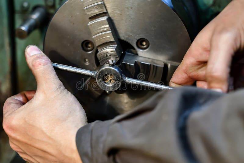 A Turner Cuts a Thread with a Lathe on a Lathe Stock Image - Image of ...