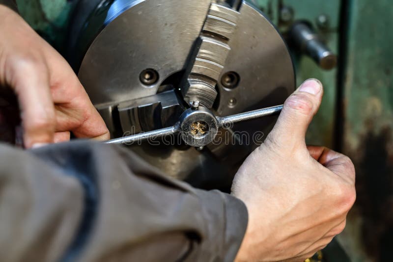 A Turner Cuts a Thread with a Lathe on a Lathe Stock Photo - Image of ...
