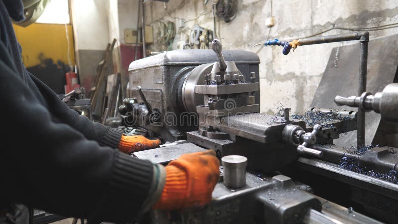 Turner Working with Old Workbench in Garage or Workshop. Mechanic Using ...