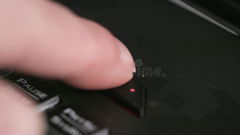 Turning on Computer, a Woman Hand Turns on Power Button on Laptop ... Turning on Computer, a Woman Hand Turns on Power Button on Laptop ...