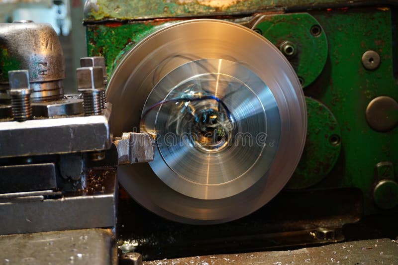 Turning a Disk Wheel by Cutting on a Machine Stock Photo - Image of ...