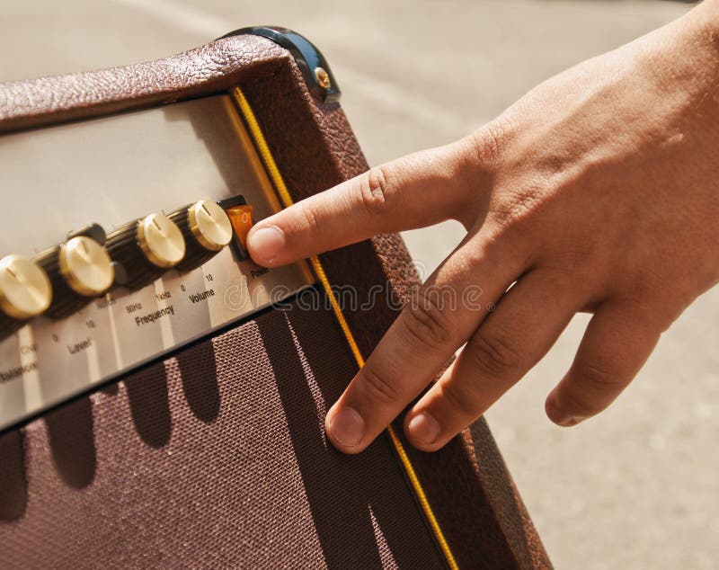 Turning guitar amplifier stock image. Image of cable - 43382079