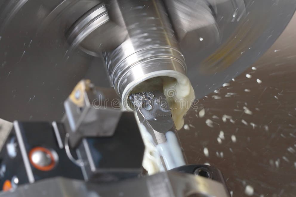 Turning lathe in action stock image. Image of metal, water - 3836783