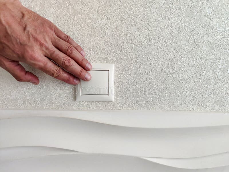 Turning Light on - Off. Man Pressing Light Switch on White Wall, Close ...