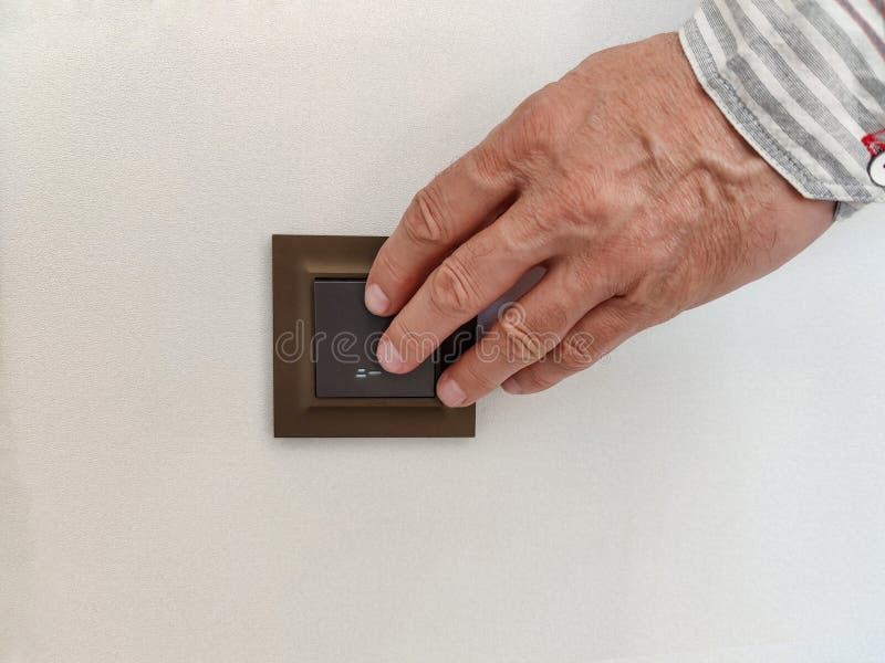 Turning Light on - Off. Man Pressing Light Switch on White Wall, Close ...