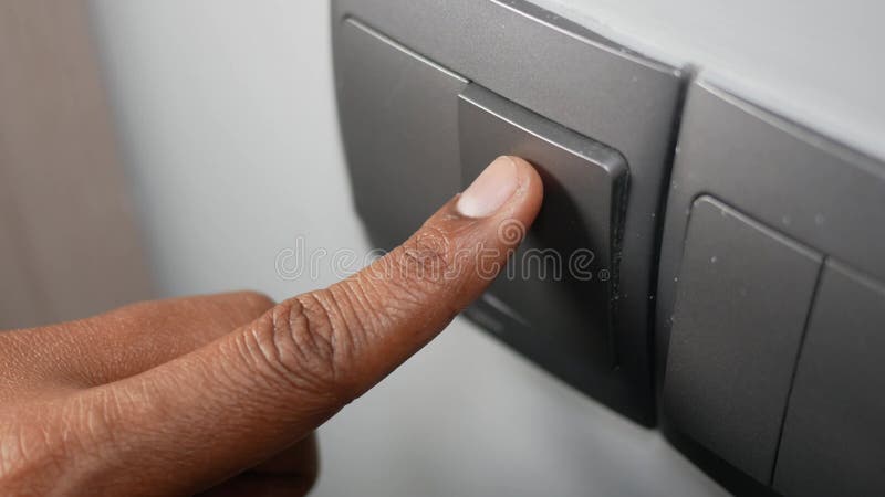 Turning on the Light Switch at Home for Better Visibility Stock Video ...