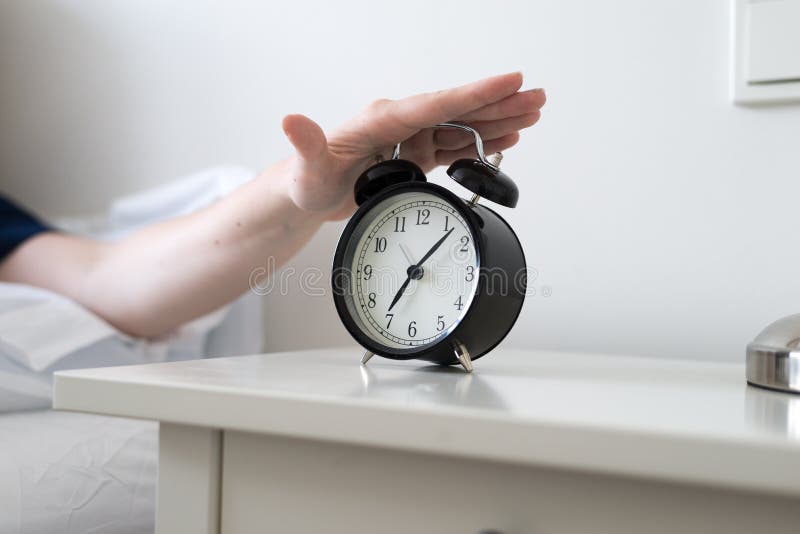 Turning off alarm clock stock image. Image of waking - 56983159