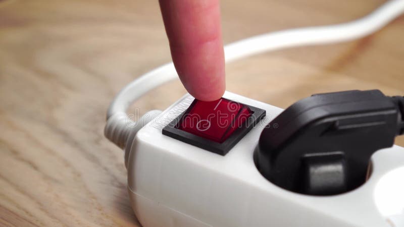 Turning Off the Power of a Electrical Appliance To Save Energy. Stock ...