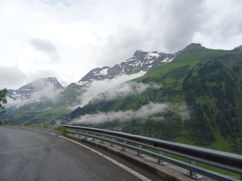 Turning the Road in the Mountains. Mountains. Fog Stock Photo - Image ...