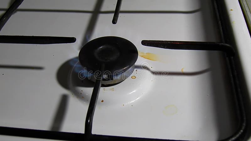 Turning Off the Gas Stove in the Kitchen with a Pan on it Stock Video ...