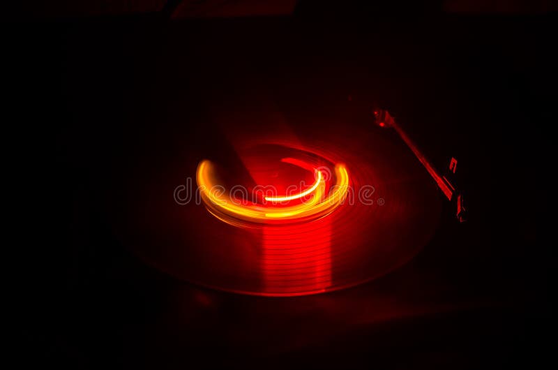 Turntable Playing Vinyl with Glowing Abstract Lines Concept on Dark ...