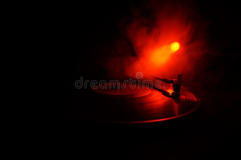 Turntable Playing Vinyl with Glowing Abstract Lines Concept on Dark ...