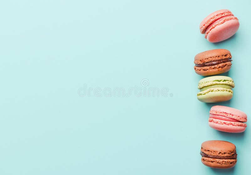 Turquoise Background with Five Macarons on the Right Side Stock Image ...