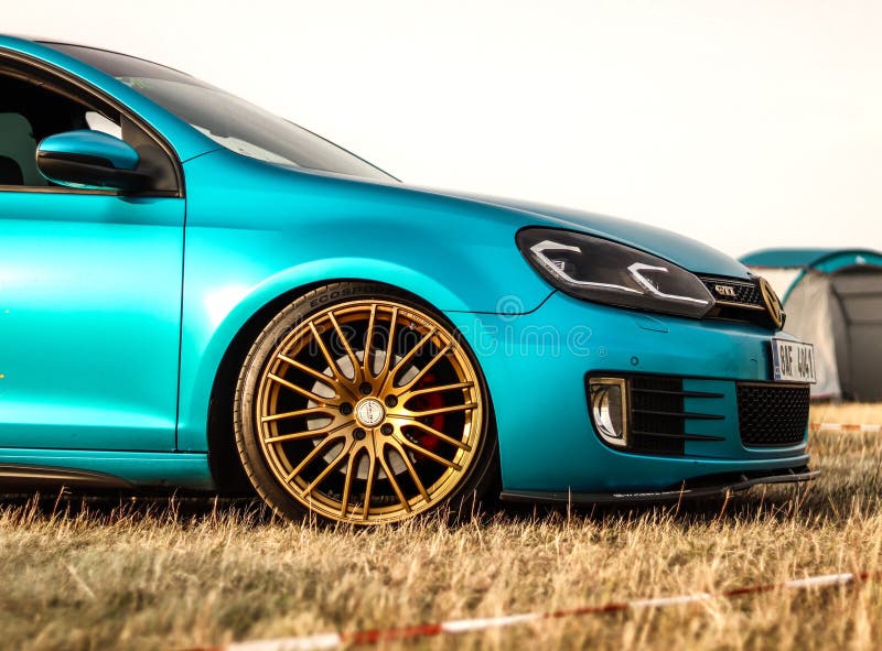 Turquoise-colored Car with Gold Rims and Wheels Editorial Stock Photo ...