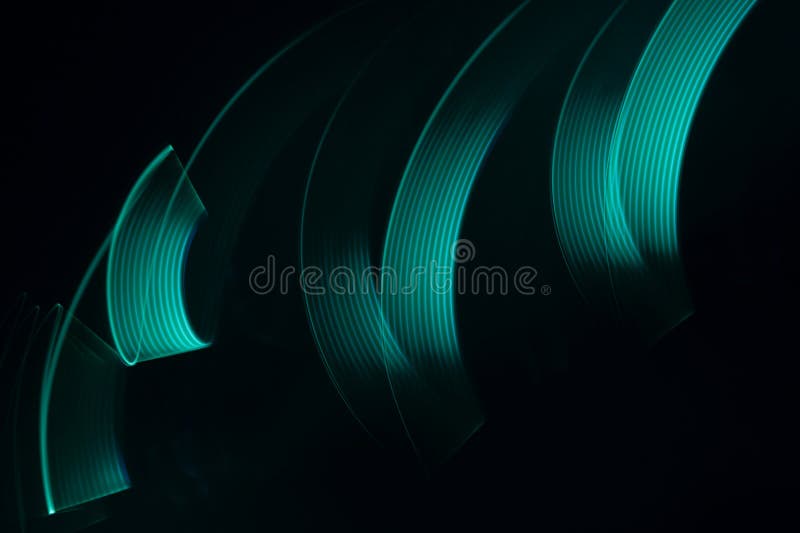 Turquoise Green Glow Neon Wave of Light with Smooth Stripes on Black ...