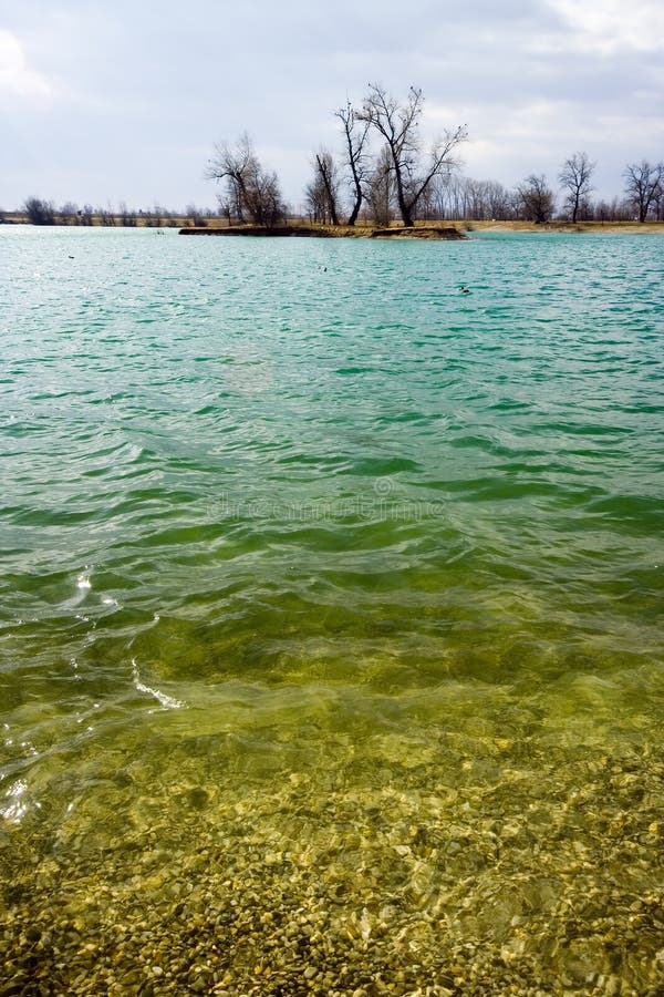 Turquoise lake stock image. Image of wave, turquoise, cloud - 1698769