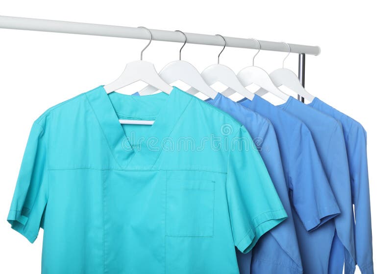 Turquoise and Light Blue Medical Uniforms on Rack Against White ...