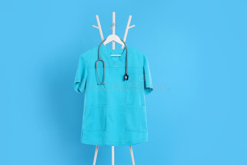 Turquoise Medical Uniform and Stethoscope Isolated on White Stock Image ...